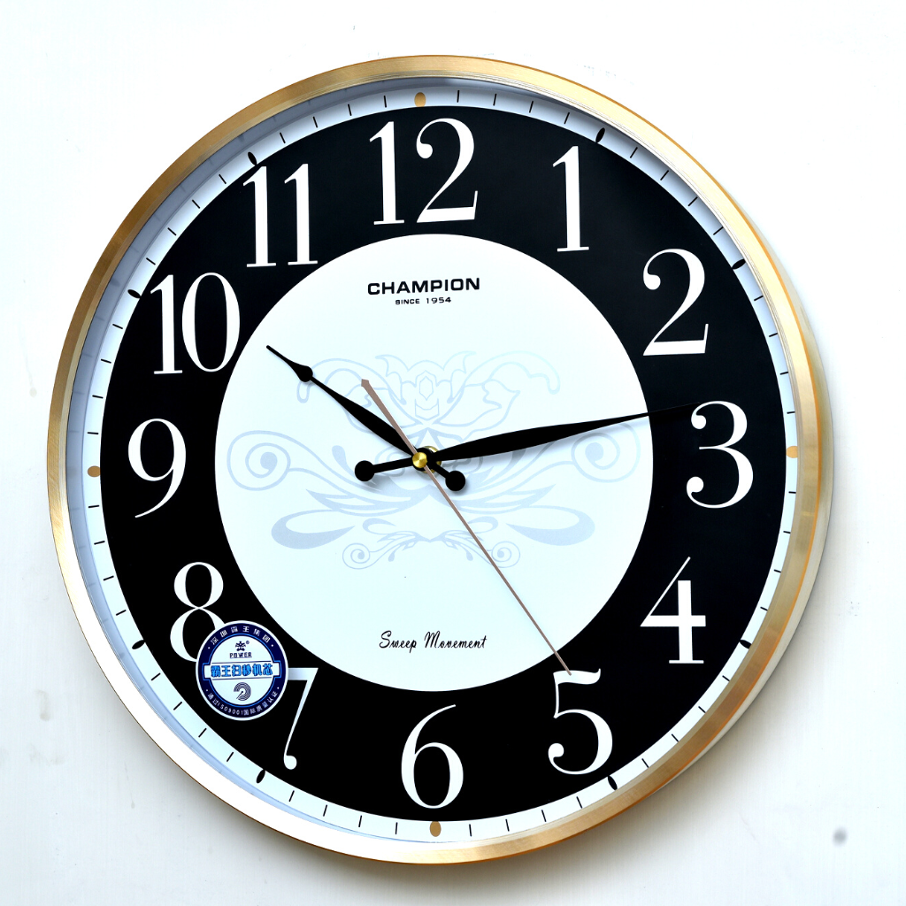 Champion Non ticking Stain less Steel Round wall clock with Multi shad ...
